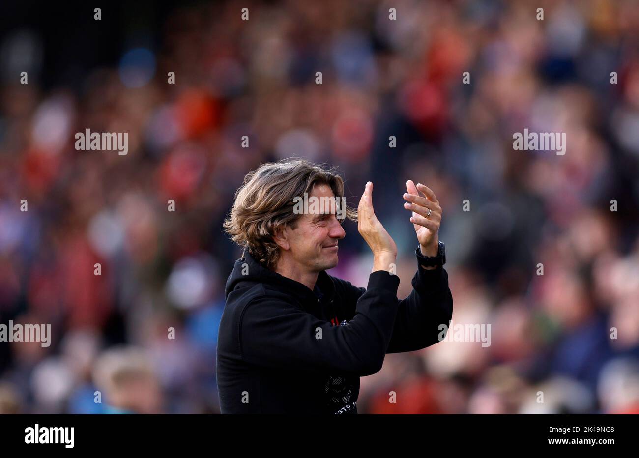Brentford manager Thomas Frank applauds the fans after the Premier ...
