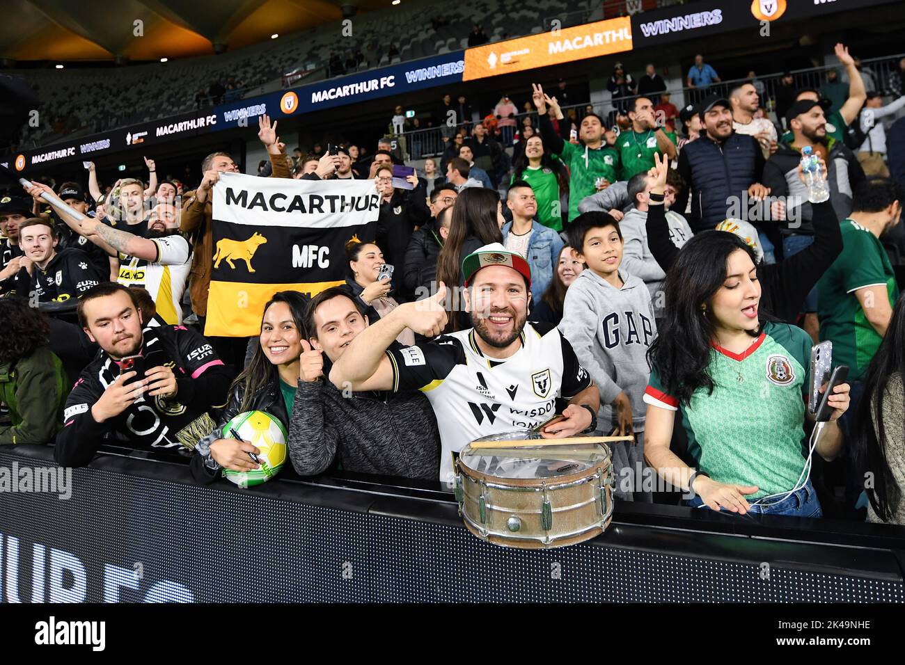 SYDNEY, AUSTRALIA - OCTOBER 01: Macarthur FC fans celebrate winning the ...
