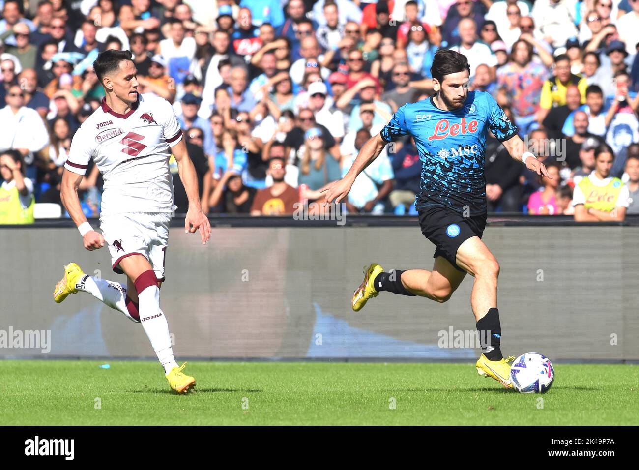 Naples, Italy. 01st Oct, 2022. Khvicha Kvaratskhelia of SSC Napoli and Sasa Lukic of Torino FC ...