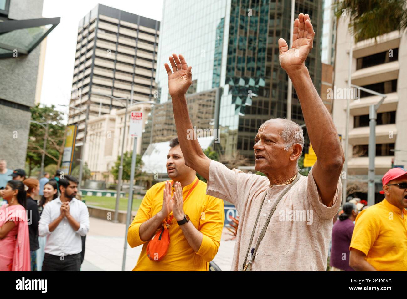 A man chants to the crowd during the Festival of Chariots Parade in ...