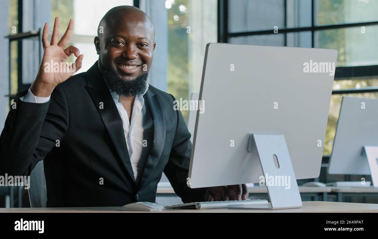 Happy african american businessman adult worker typing on laptop ...