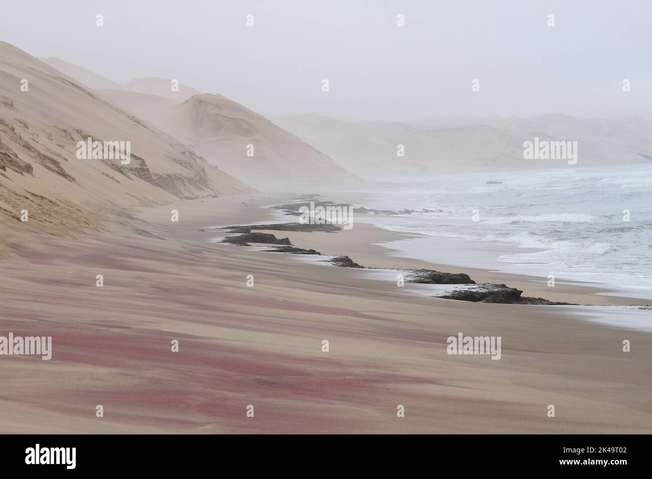 The view of sea waves reaching the sandy coastline in the morning Stock ...