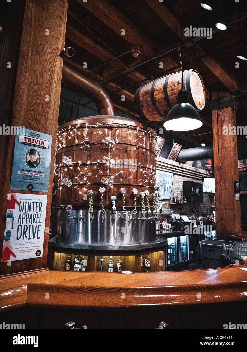 An interior with wooden barrels in a bar Stock Photo - Alamy