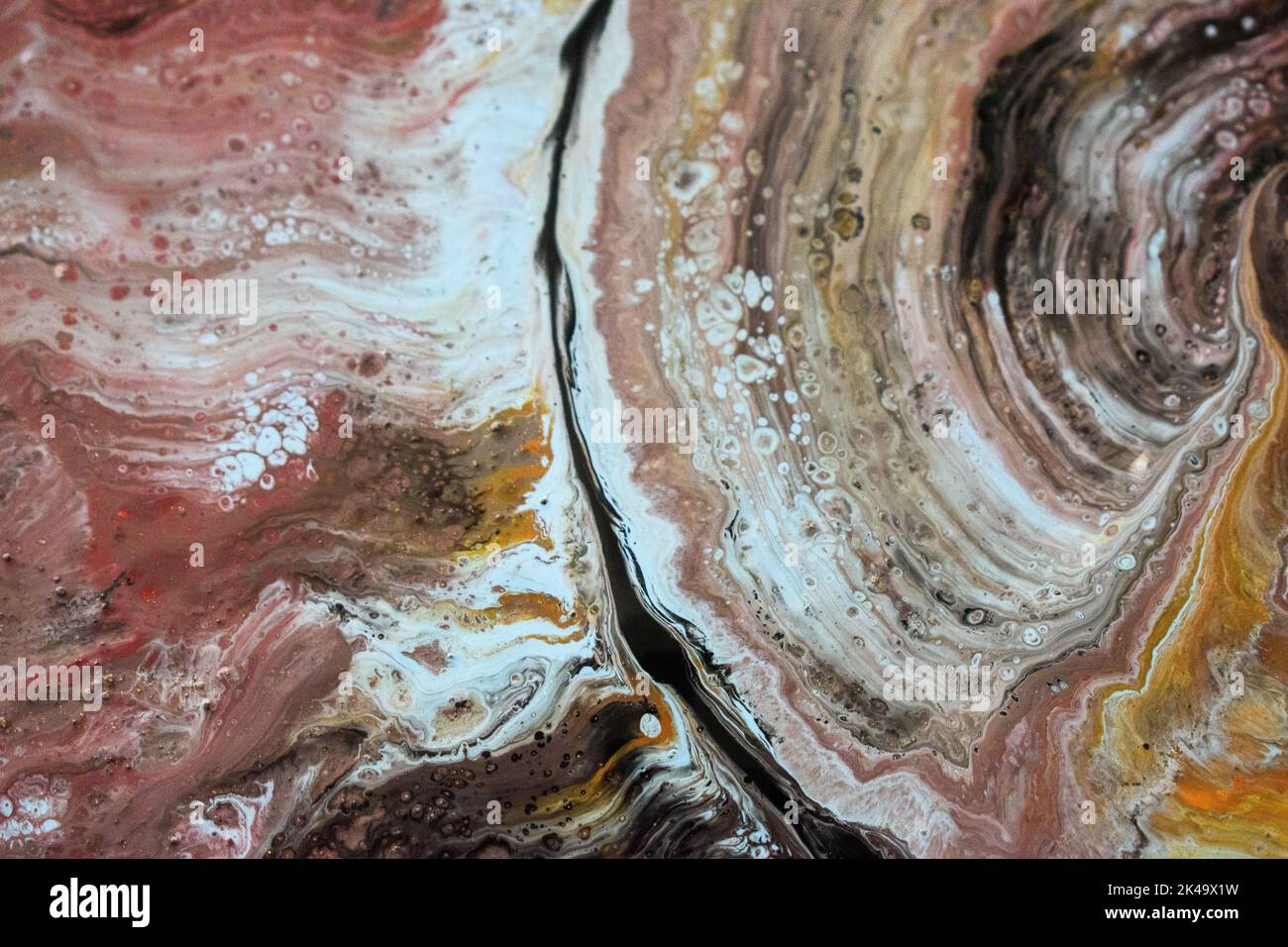 A closeup shot of a colorful marble paint surface background for ...
