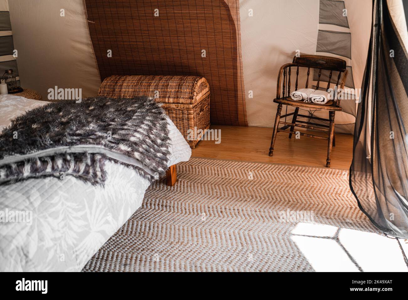 calm and quiet room in a tent decorated with a nice vintage wooden ...