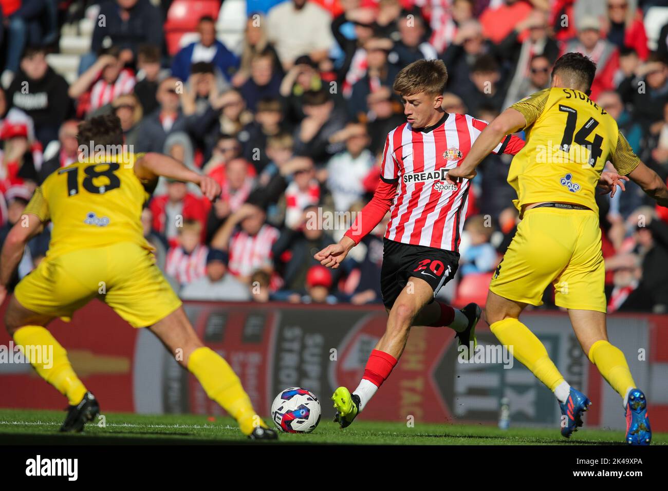 Jack Clarke #20 of Sunderland battles Jordan Storey #12 of Preston ...