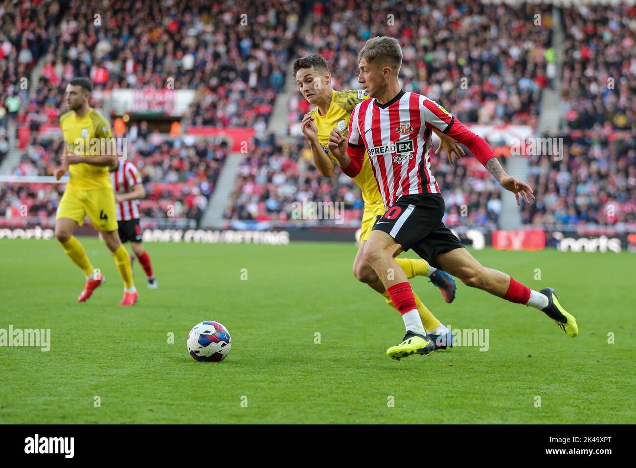Jack Clarke #20 of Sunderland battles Jordan Storey #12 of Preston ...