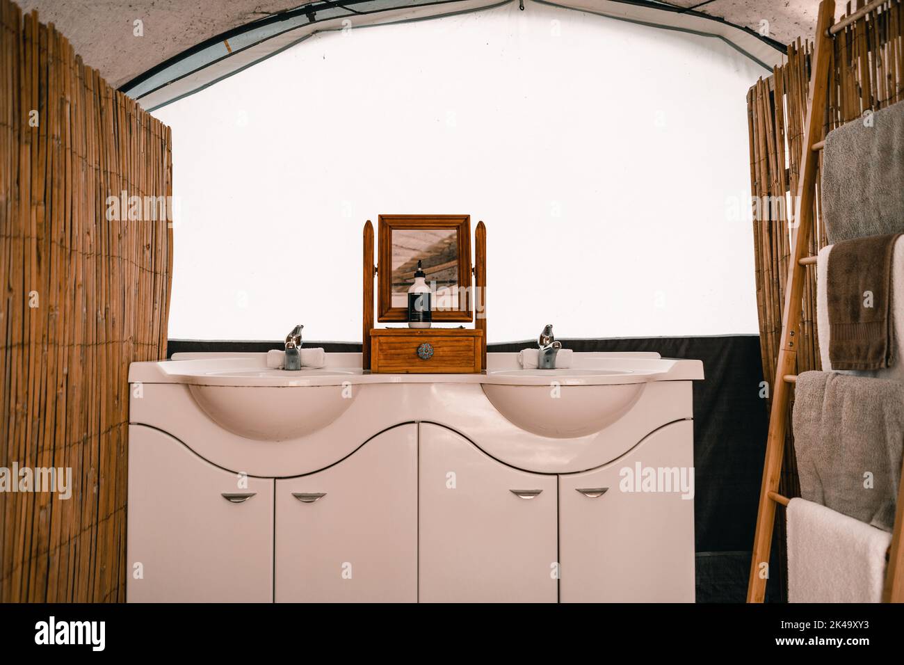 bathroom with double sinks silver faucets vanity unit with mirror and ...