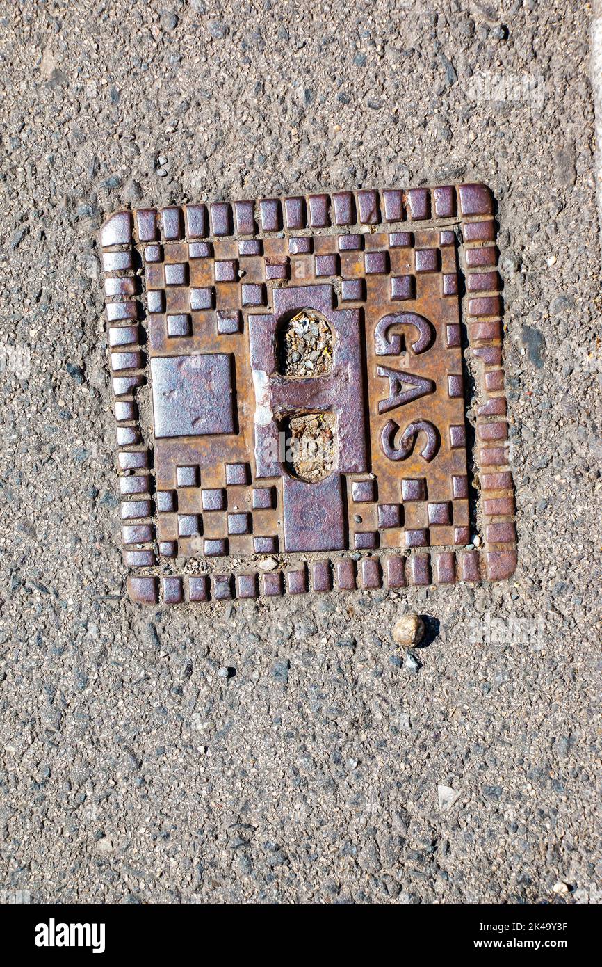 Manhole cover of the gas pipeline system. A massive metal hatch for ...