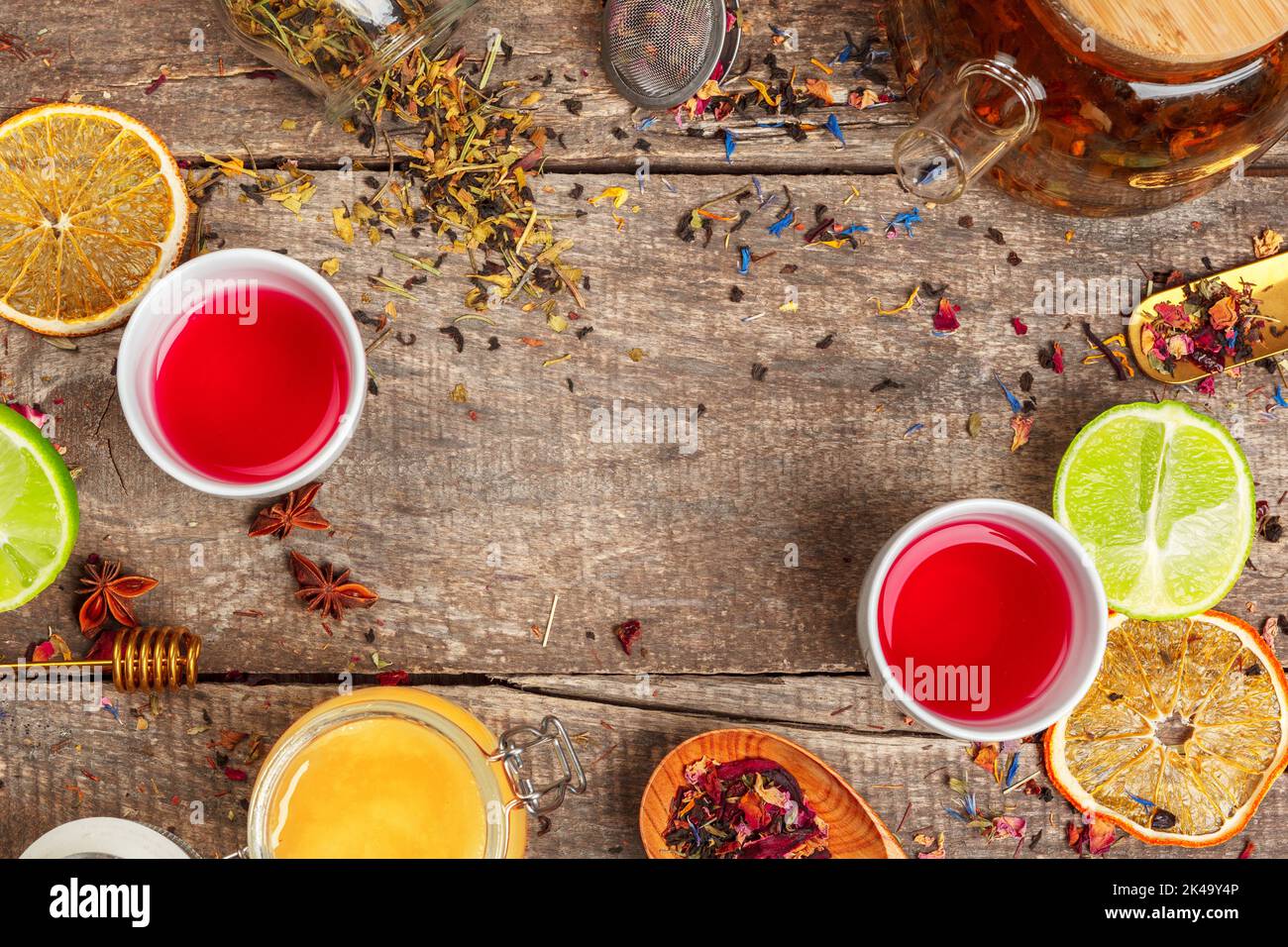 cups of healthy herbal tea with cinnamon, dried rose and camomile ...