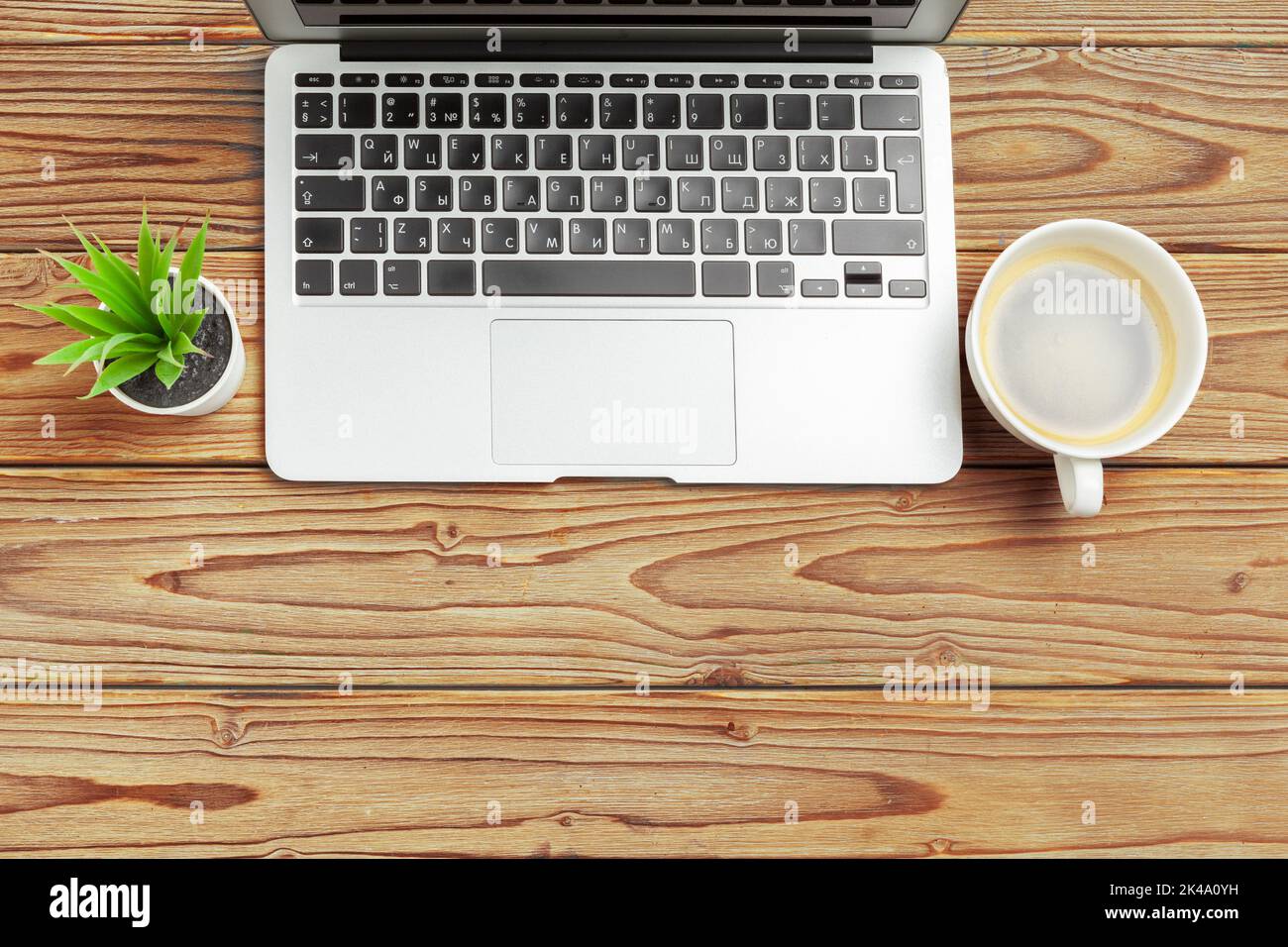 Wooden office desk table and equipment for working with black coffee in ...