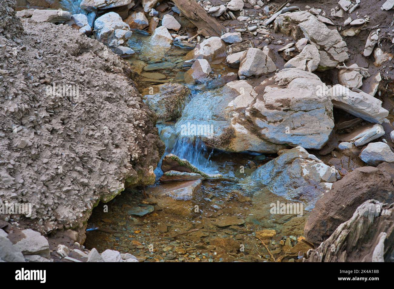 A closeup shot of the rocks on the shore of the Goldisthal pumped ...
