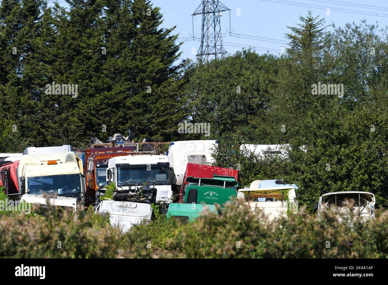 heavy goods vehicles in a scrapyard Stock Photo - Alamy