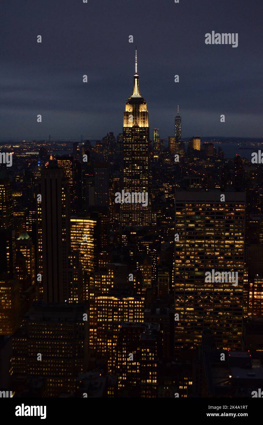 The buildings with bright lights in the city during nighttime Stock ...