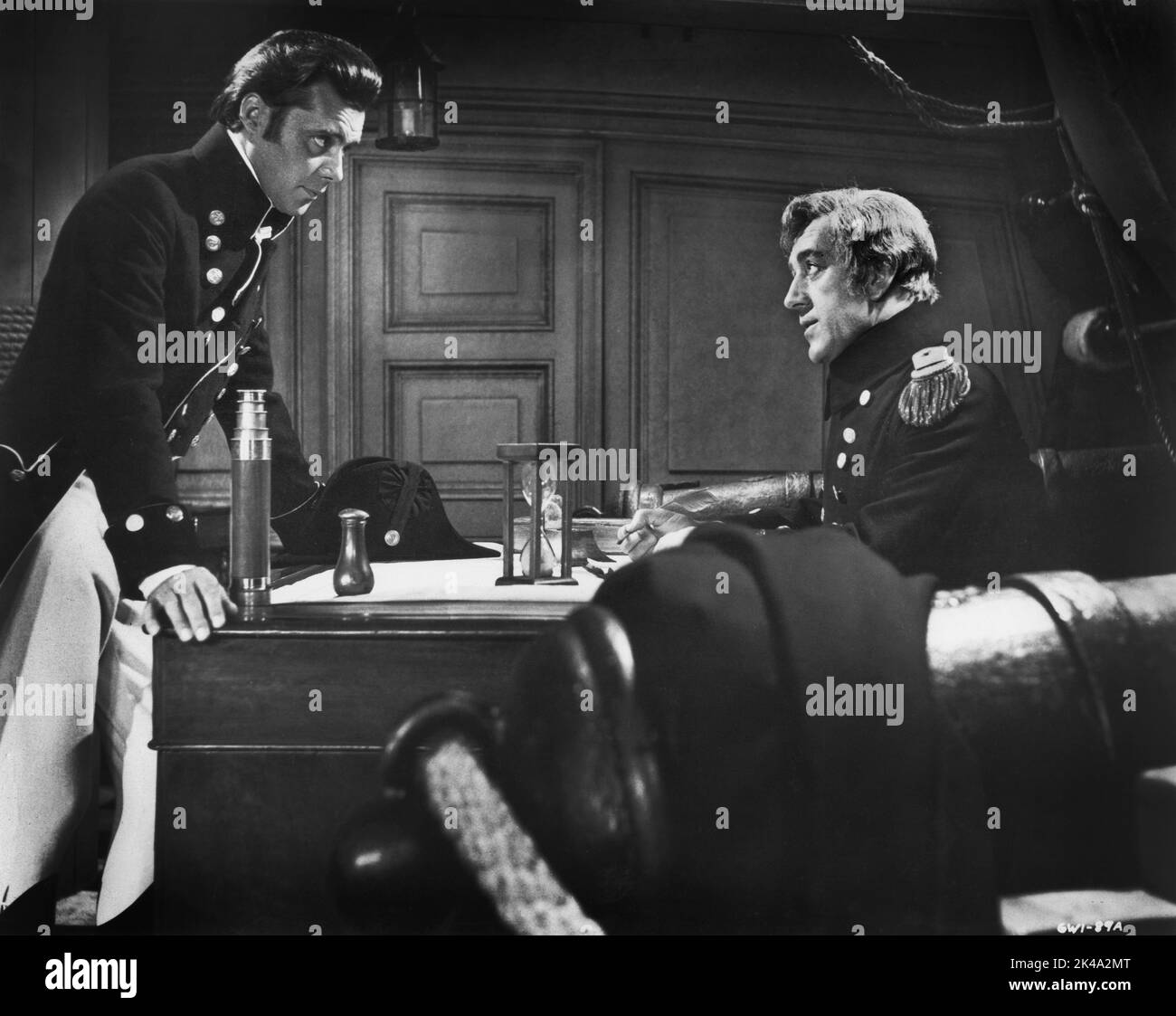 Dirk Bogarde, Alec Guinness, on-set of the British Film, "H.M.S ...