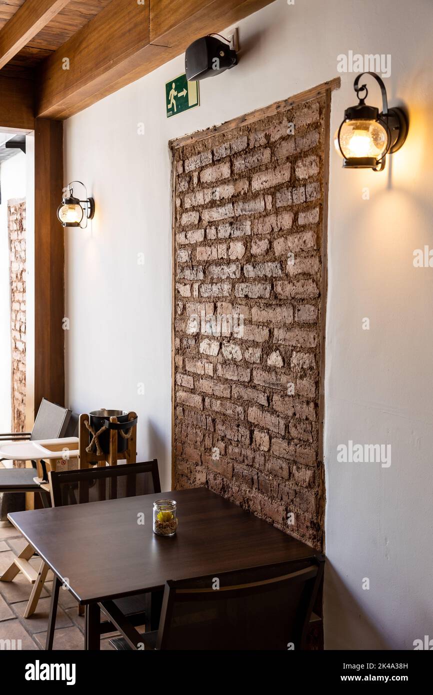 The interior of a restaurant with tables ready to be served Stock Photo ...