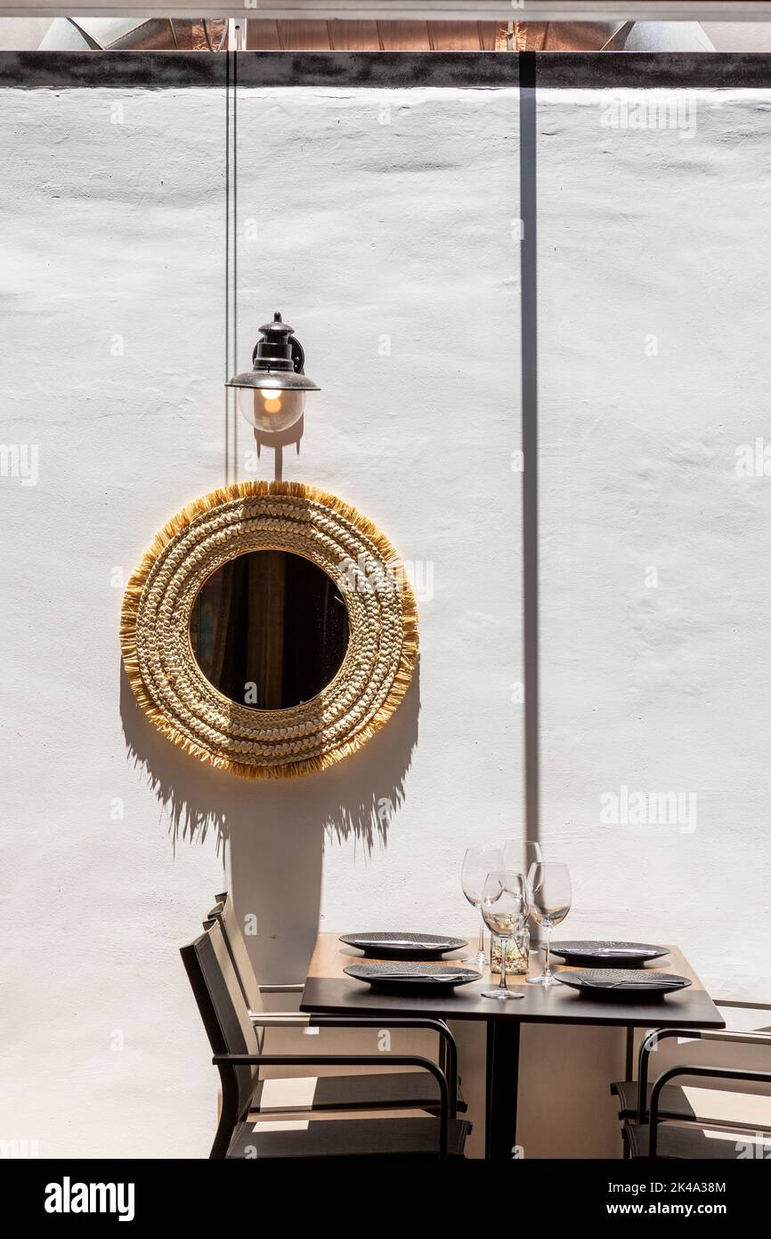 The interior of a restaurant with tables ready to be served Stock Photo ...