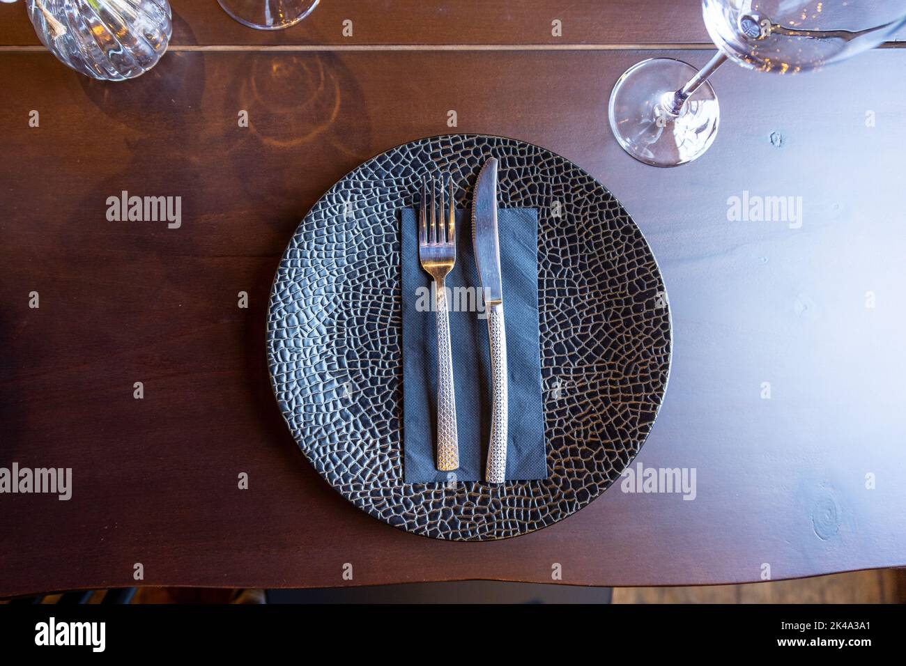 The interior of a restaurant with tables ready to be served Stock Photo ...