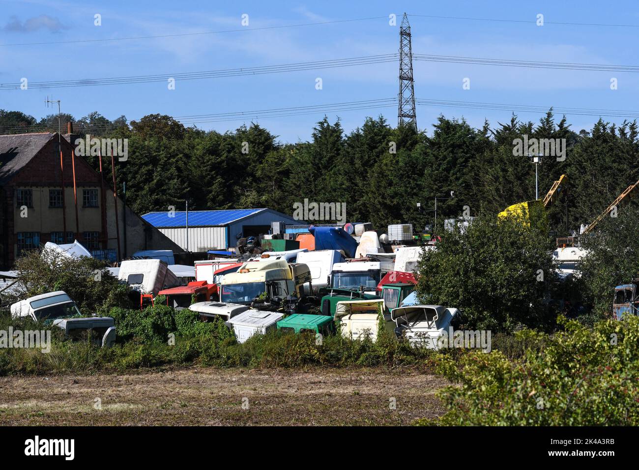 heavy goods vehicles in a scrapyard Stock Photo - Alamy
