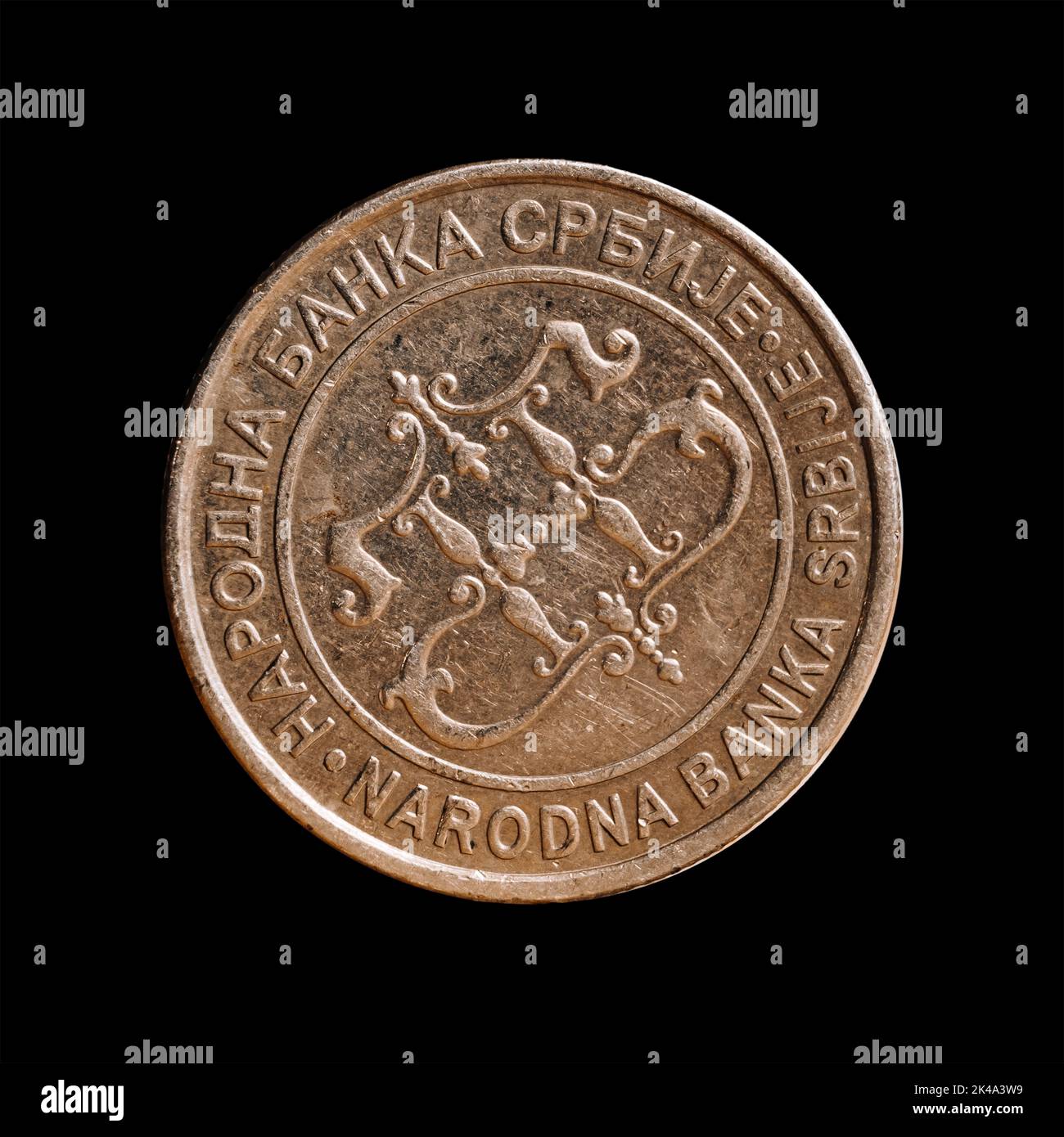 A closeup of Serbian dinar coin on the black background Stock Photo - Alamy