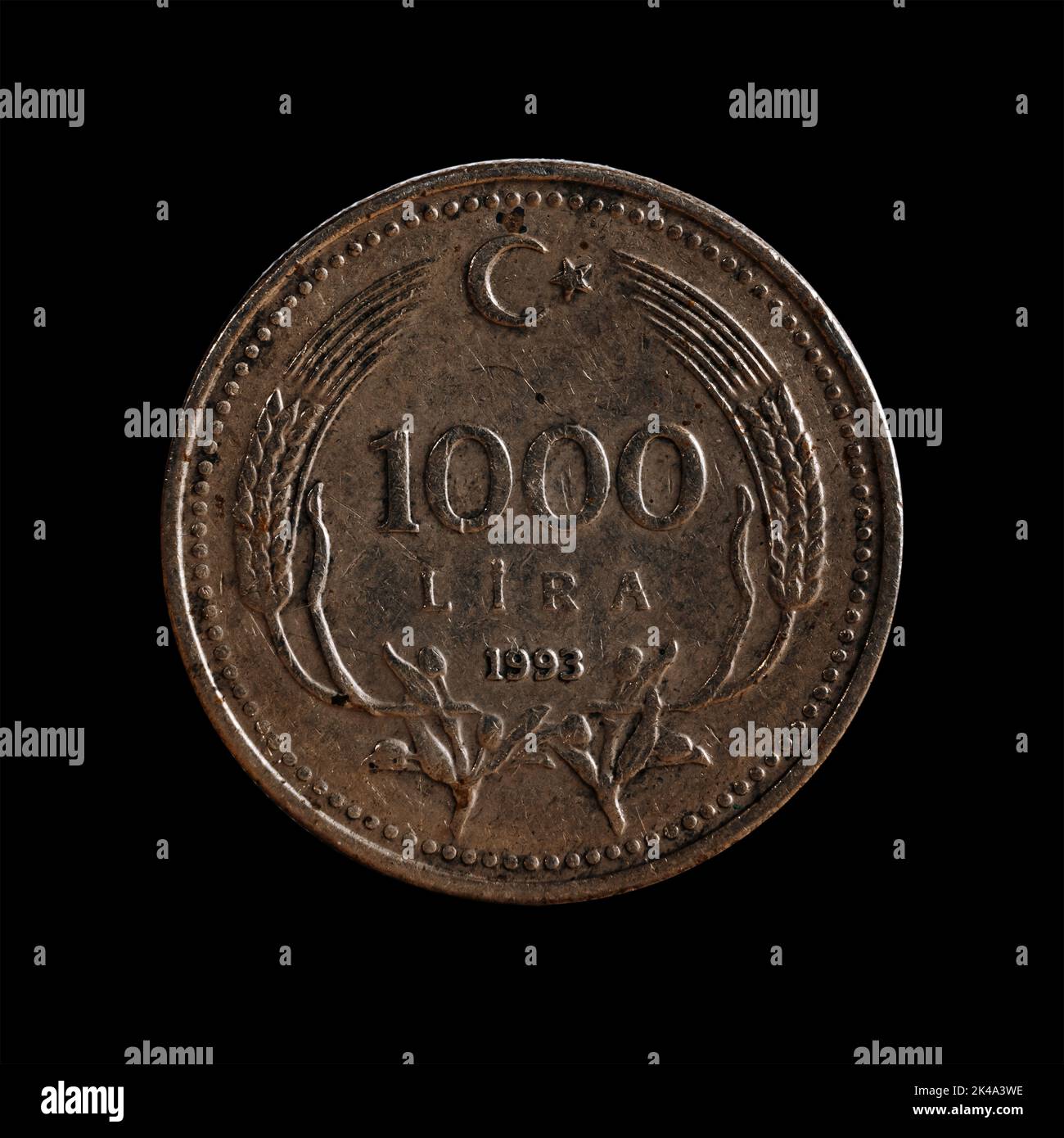 A closeup of Turkey 1000 Lira Coin 1993 on the black background Stock ...