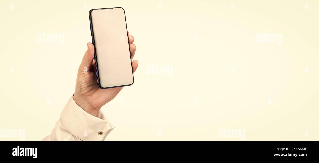 hand holding smartphone with screen copy space isolated on white ...