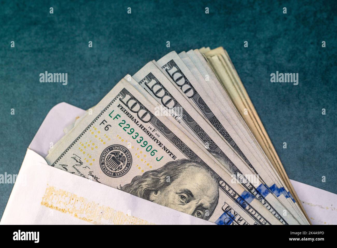 Hundred dollar bills in envelope hi-res stock photography and images ...
