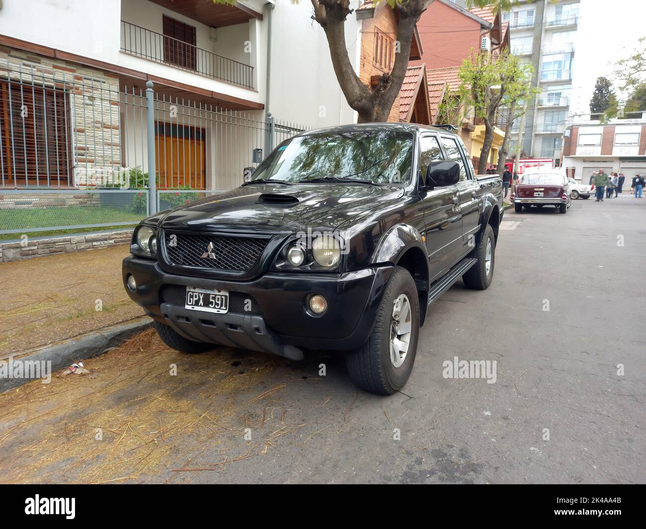 utility black 2000s Mitsubishi L200 Mighty Max 4x4 pickup truck parked ...