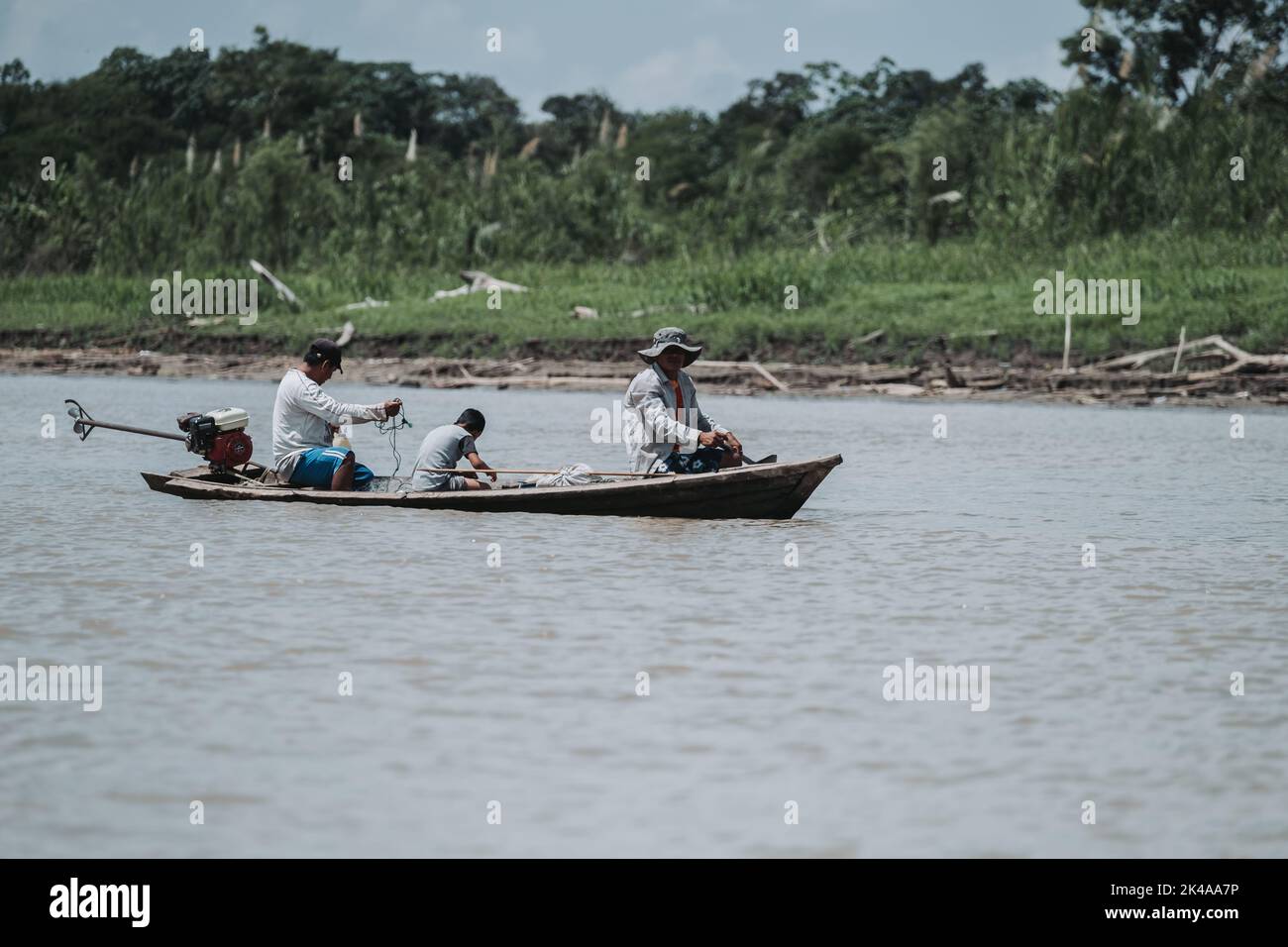 The people on the boat fishing on the Amazon river Stock Photo - Alamy