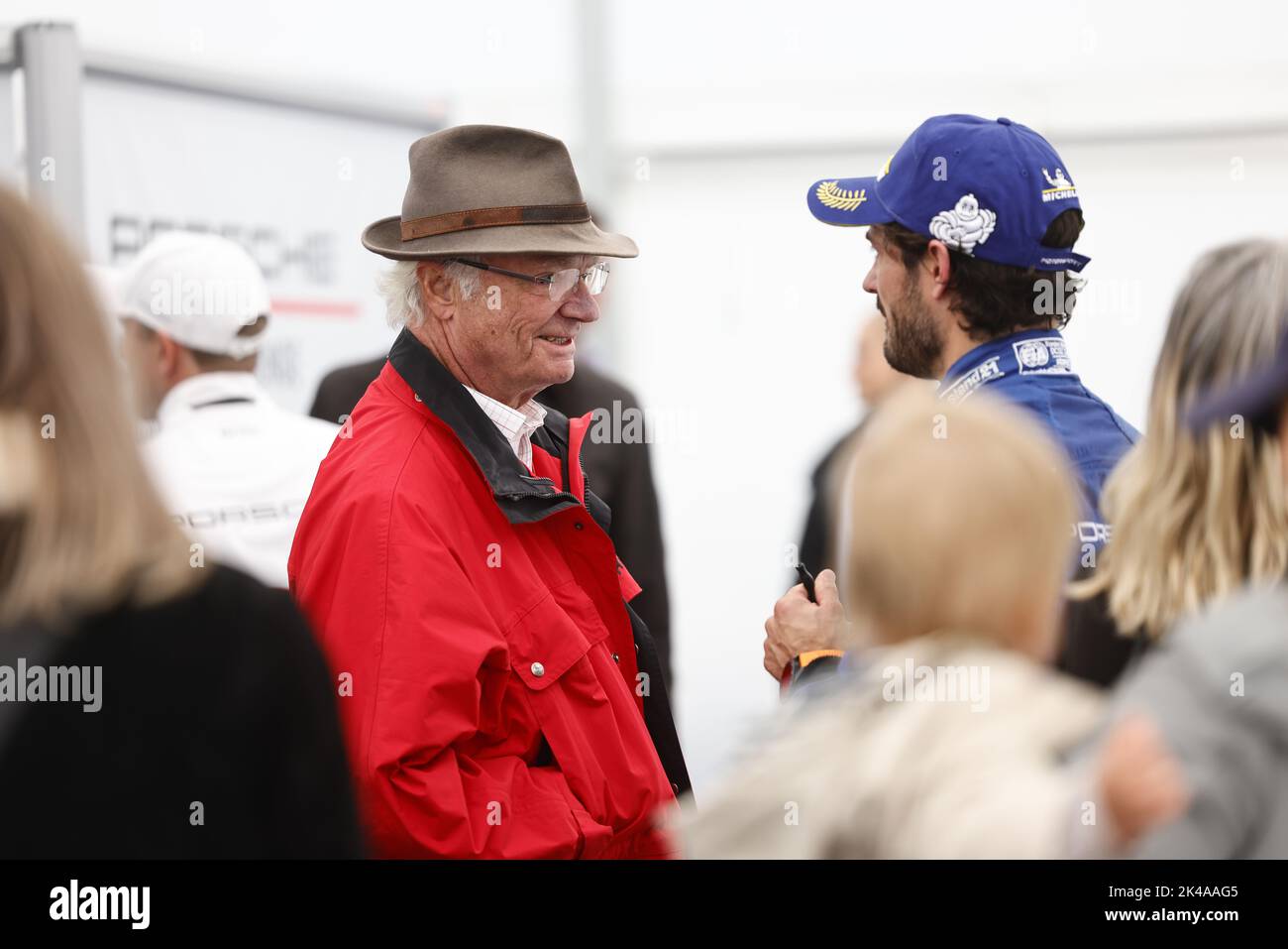 King Carl Gustaf talks to Prince Carl Philip after race 2 of the ...