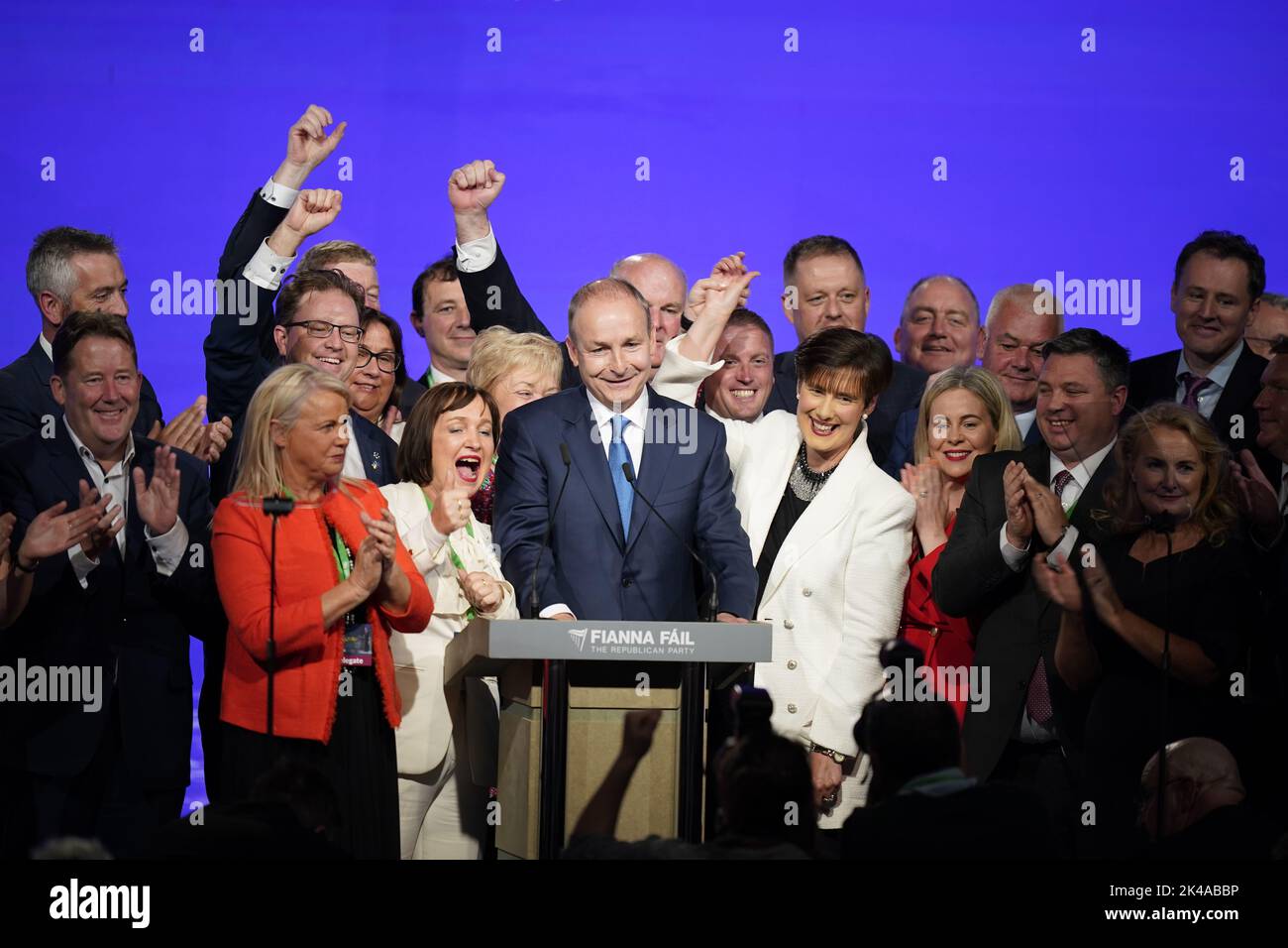 Party leader Micheal Martin is joined on stage by party representatives ...