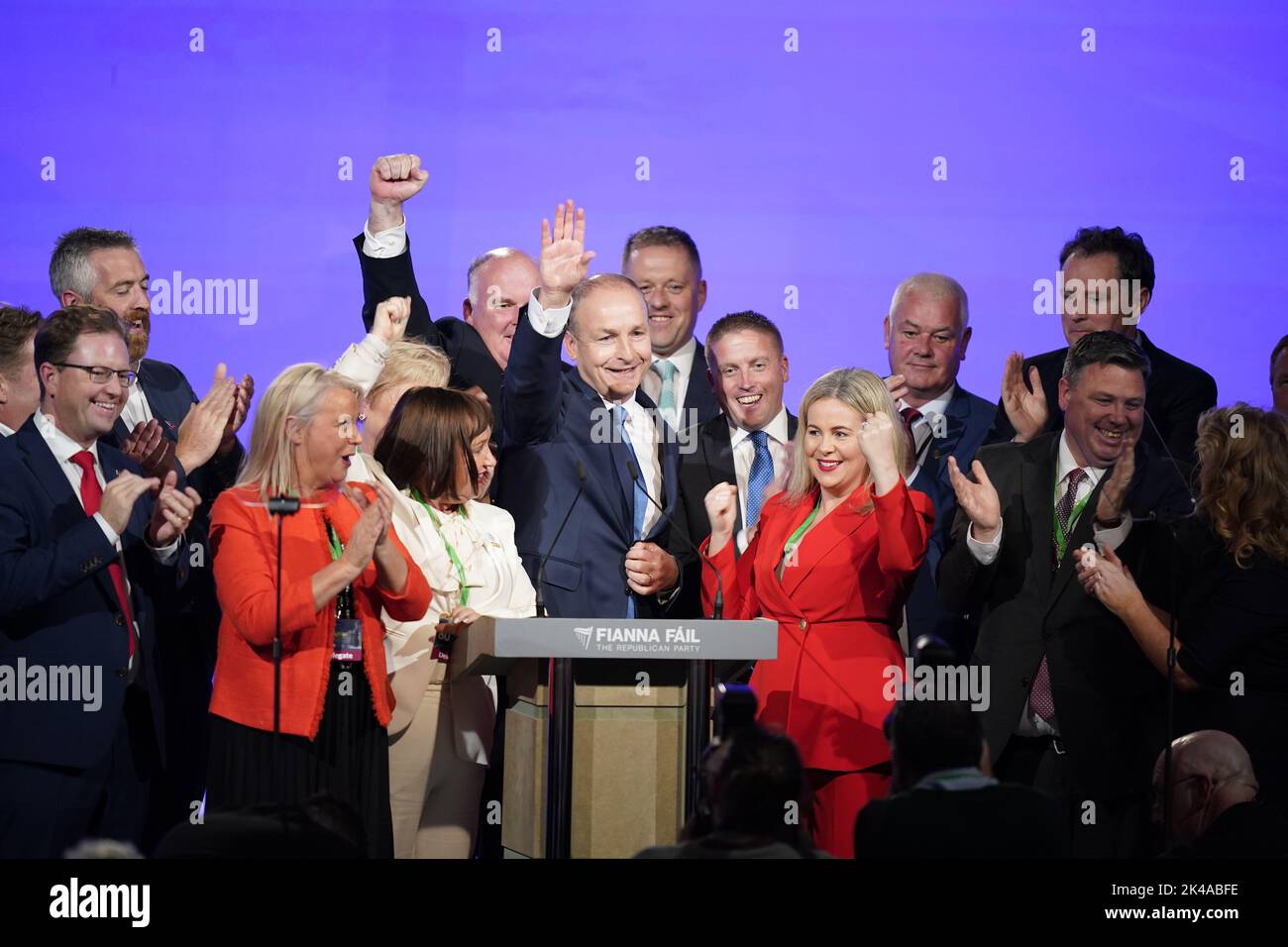 Party leader Micheal Martin is joined on stage by party representatives ...