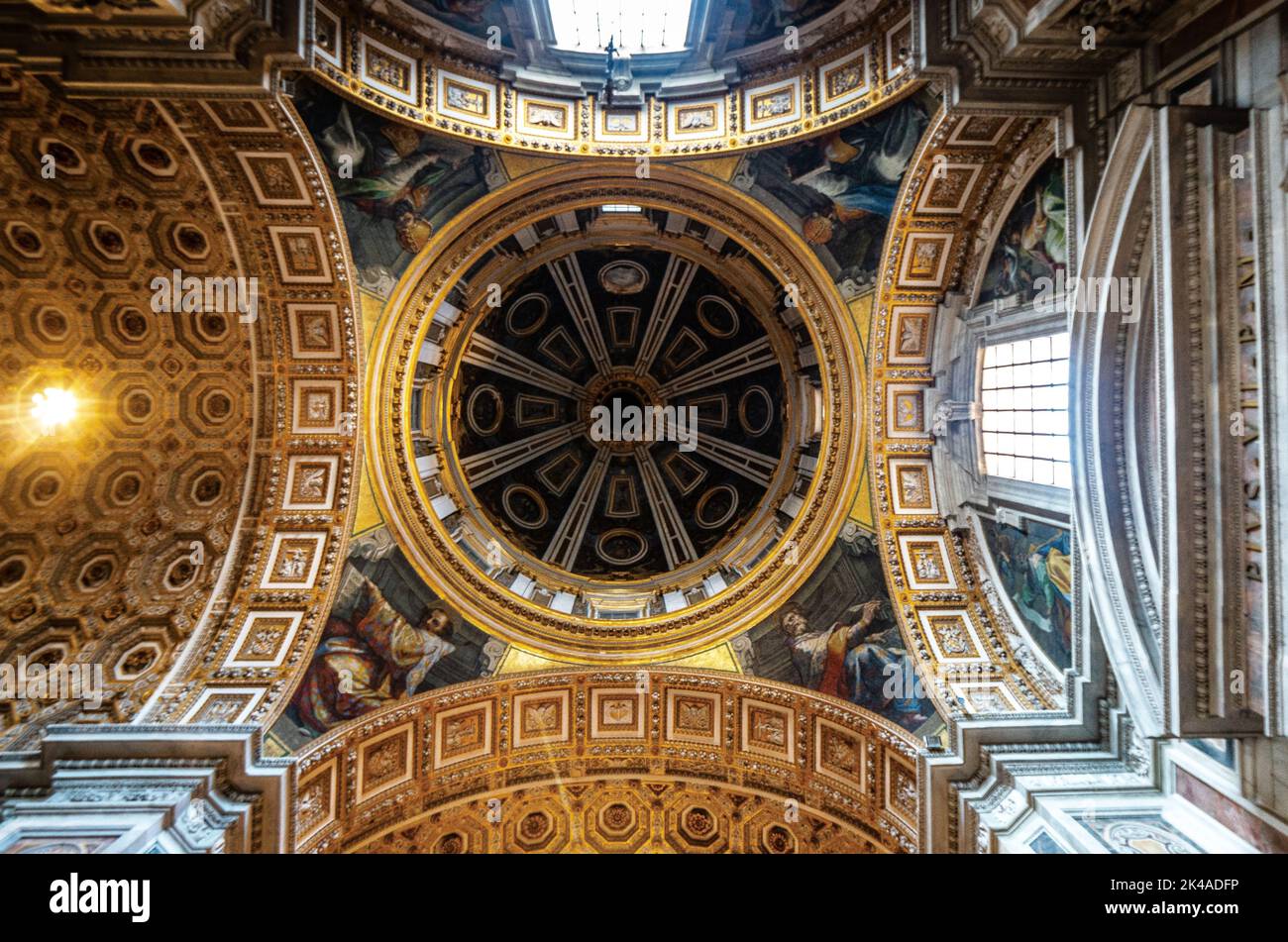A low angle shot of the interior of Saint Peter's Basilica in Rome ...