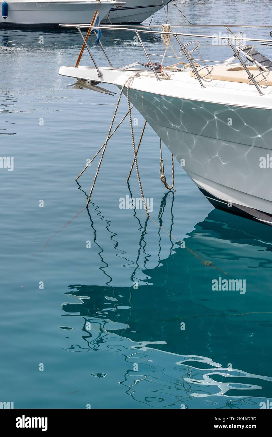 A touching line between a boat and the water Stock Photo - Alamy