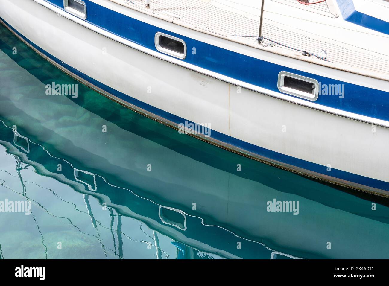 A touching line between a boat and the water Stock Photo - Alamy