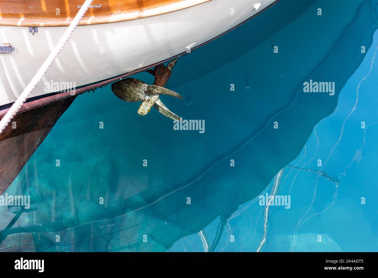 A touching line between a boat and the water Stock Photo - Alamy
