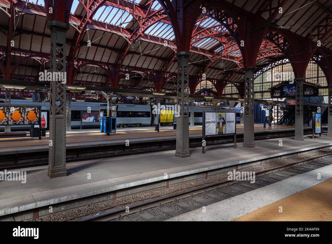 Passengers at the Copenhagen Train Station tracks, Denmark Stock Photo ...