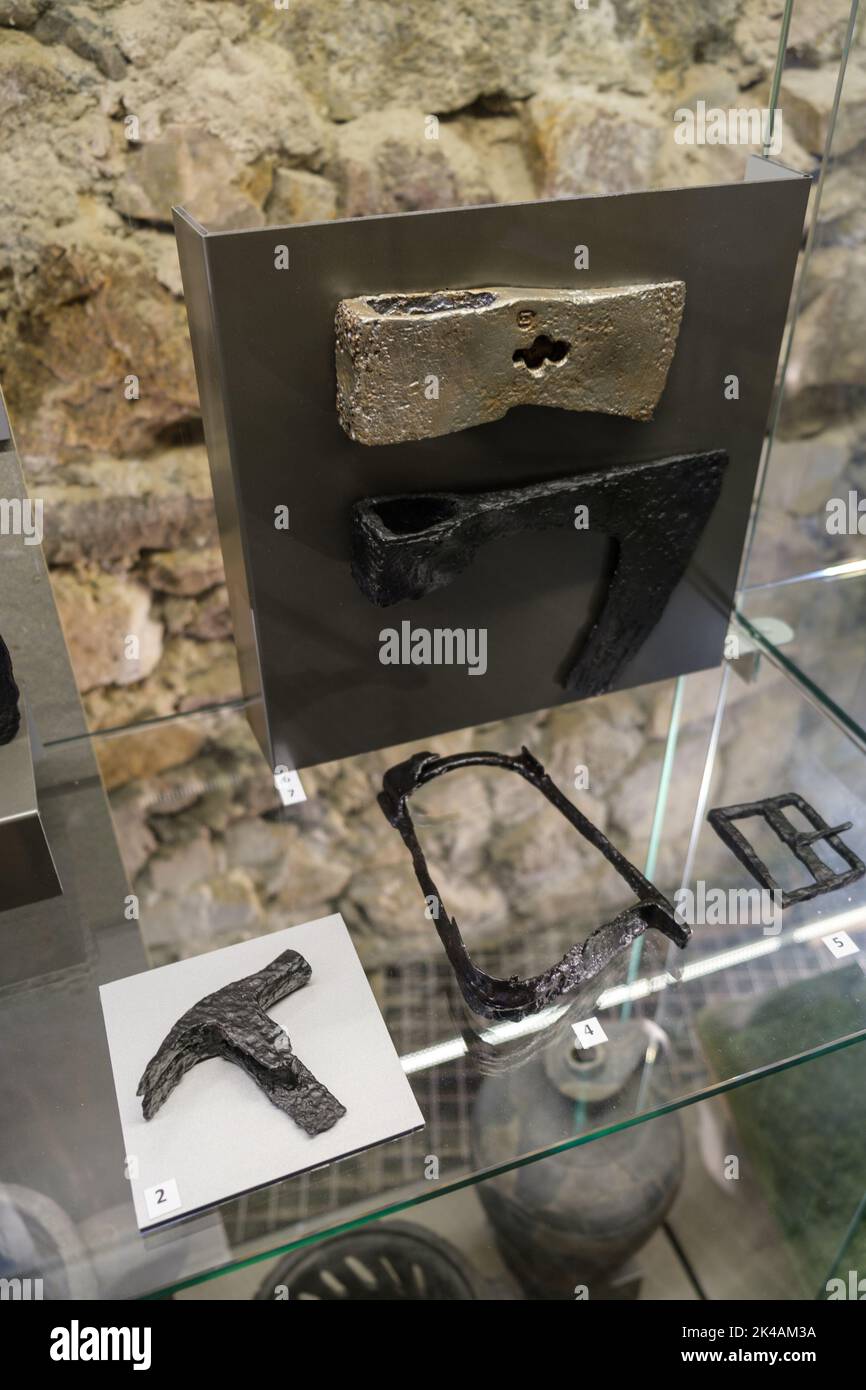 A vertical shot of glass exhibits and artifacts in the museum in Devin ...