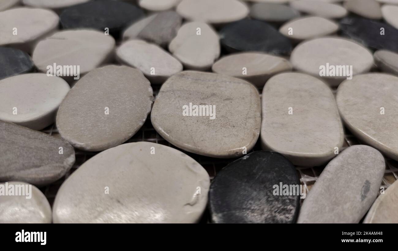 White and grey pebble stone texture wall as a background Stock Photo ...