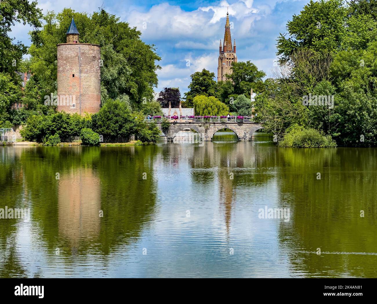 Beautiful Minnewater park at Bruges with scenic waterscape and greenery ...