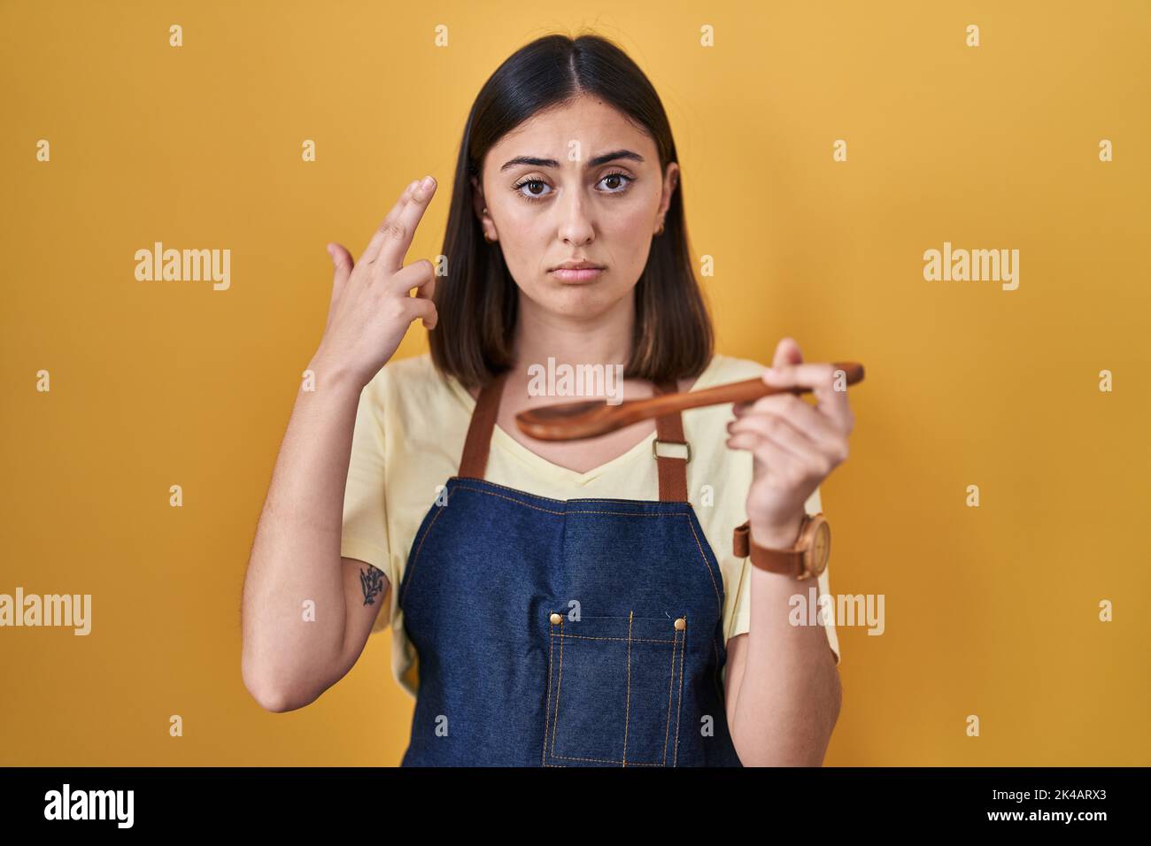 Hispanic girl eating healthy wooden spoon shooting and killing oneself ...