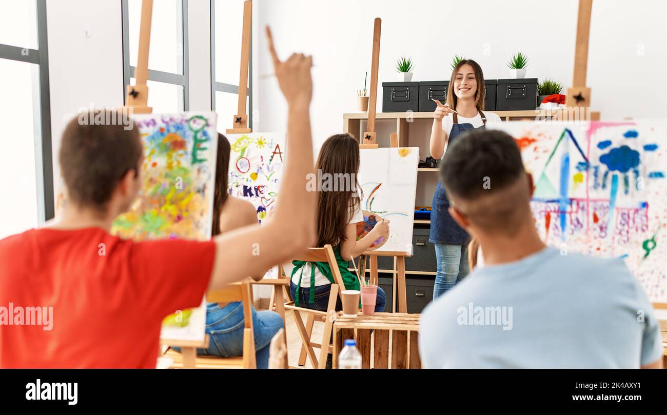 Group of people having paint lesson at art studio Stock Photo - Alamy