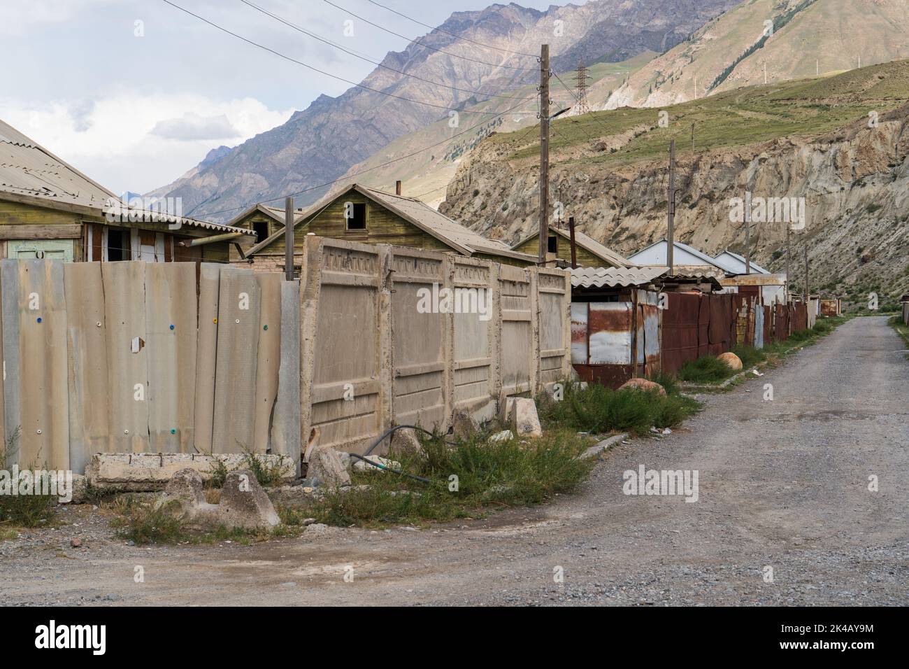 Dilapidated houses in abandoned ghost town Enilchek in South East ...