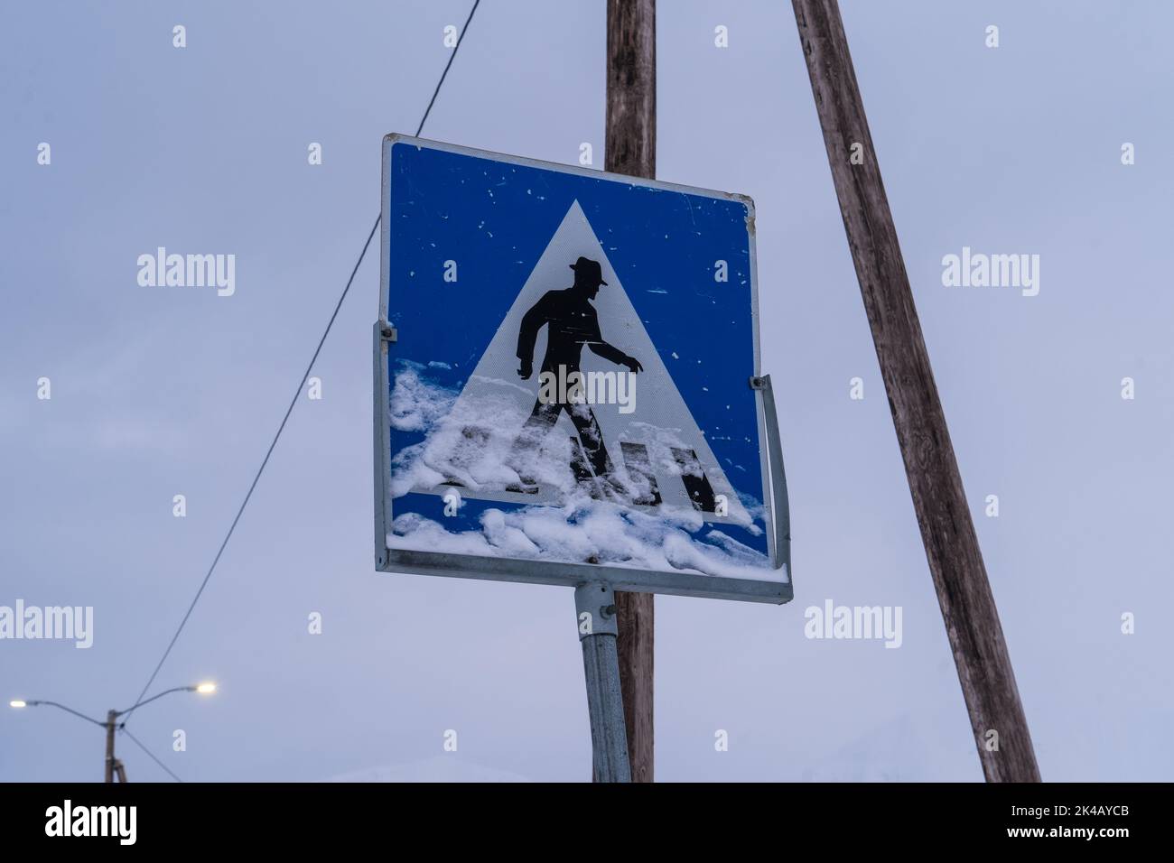 Longyearbyen snow-covered pedestrian crossing sign, Svalbard Stock ...