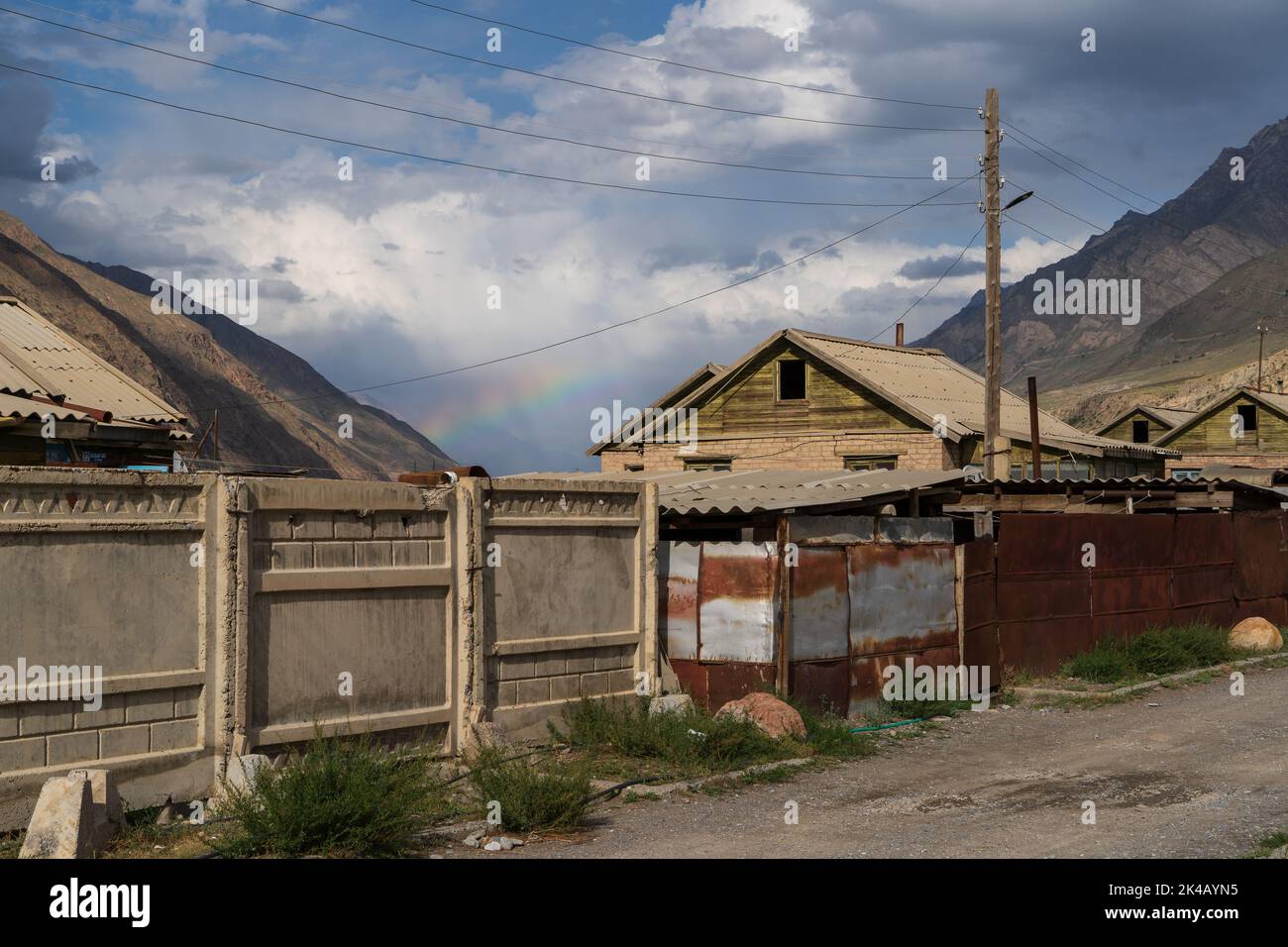 Dilapidated houses in abandoned ghost town Enilchek in South East ...