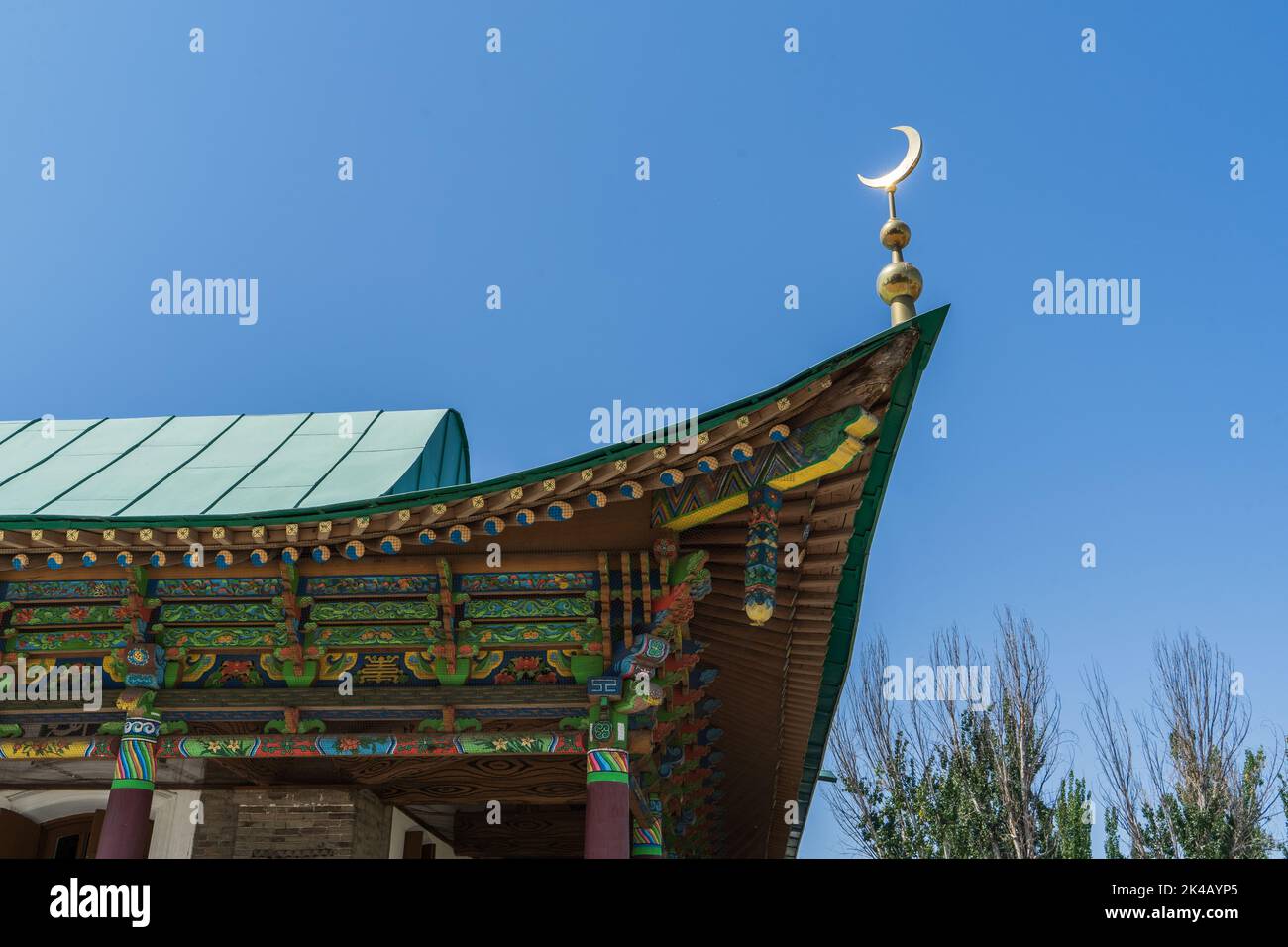 Colourful timber exterior structure and pagoda of Chinese Dungan Uyghur ...