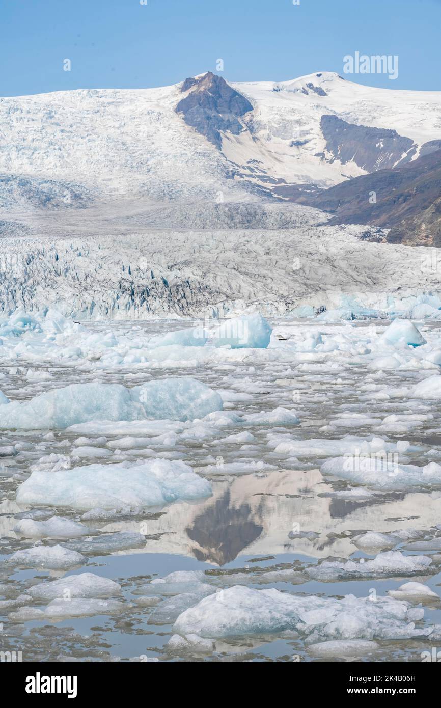 Glacier lagoon, ice lagoon Fjallsarlon, ice floes in front of glacier ...