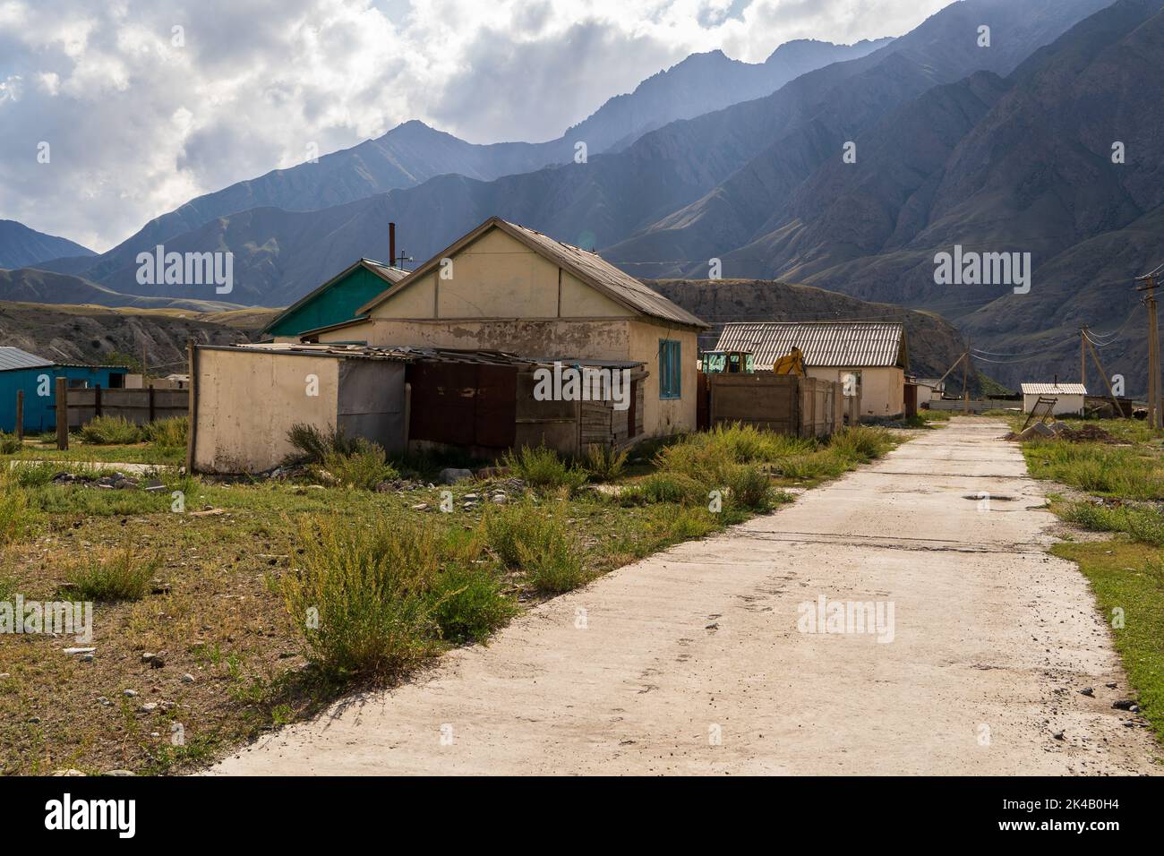 Dilapidated houses in abandoned ghost town Enilchek in South East ...