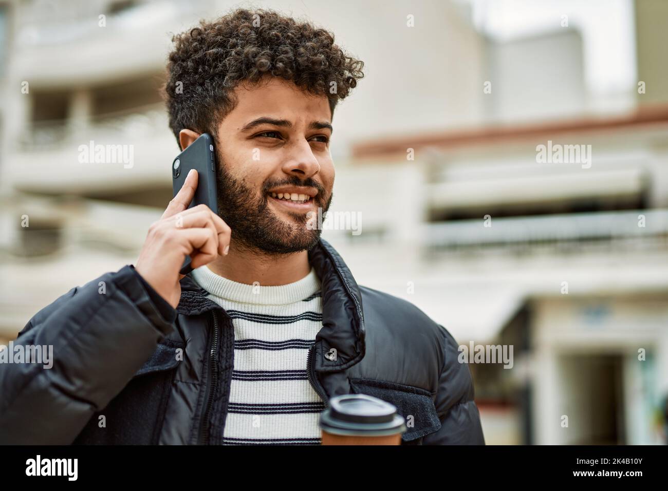 Young arab man speaking on the phone outdoor at the town Stock Photo ...