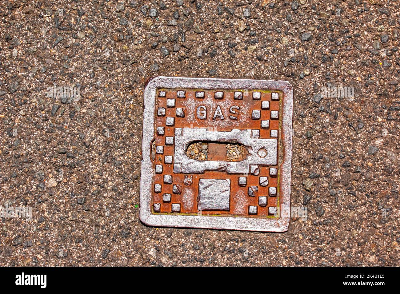 Manhole cover of the gas pipeline system. A massive metal hatch for ...